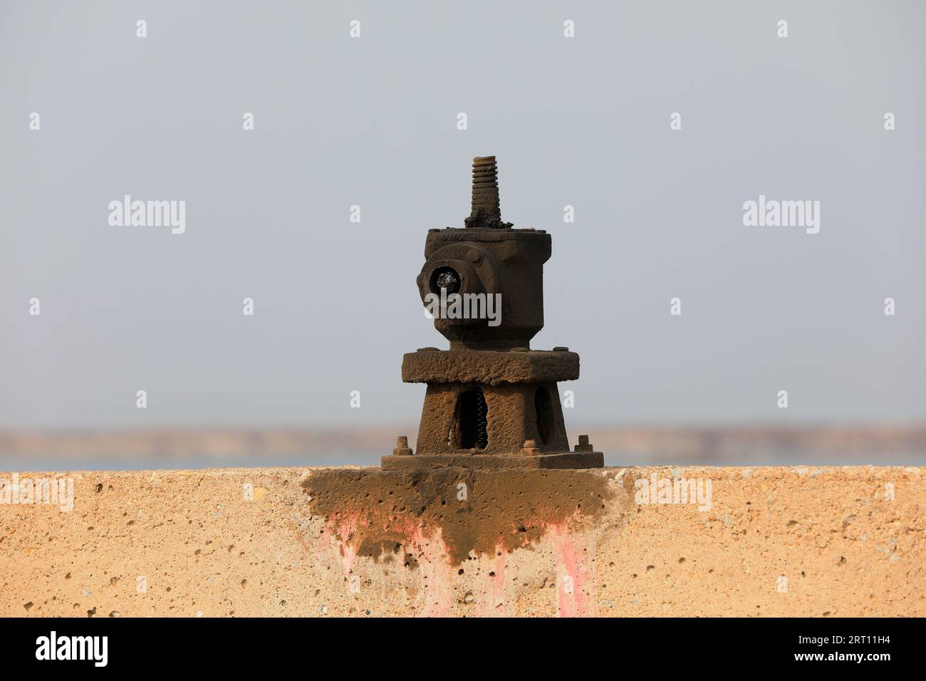 Oil stained sluice components Stock Photo - Alamy