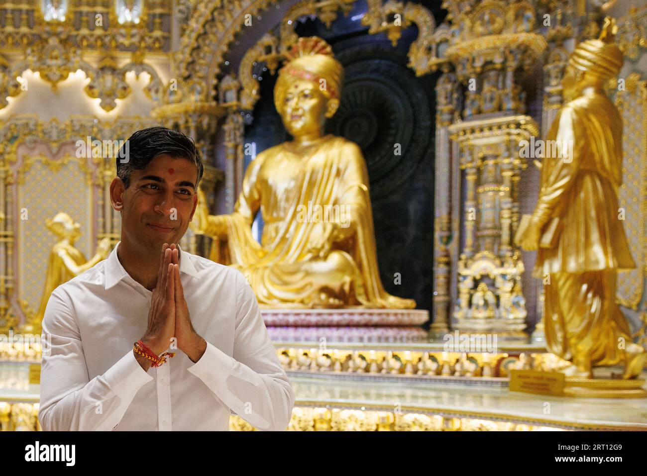 Prime Minister Rishi Sunak during a visit to the Swaminarayan ...