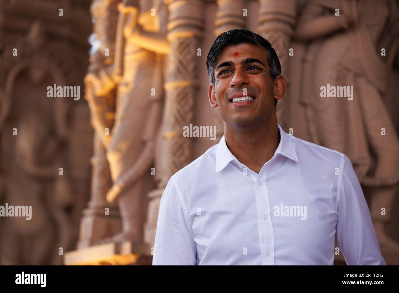 Prime Minister Rishi Sunak during a visit to the Swaminarayan ...