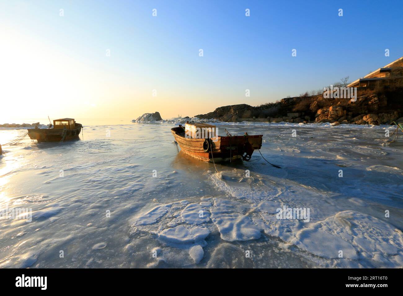 wooden boat in sea ice Stock Photo - Alamy