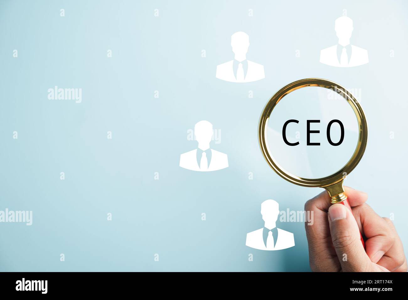 Magnifying glass highlights HR officer looking for leader and CEO Stock ...