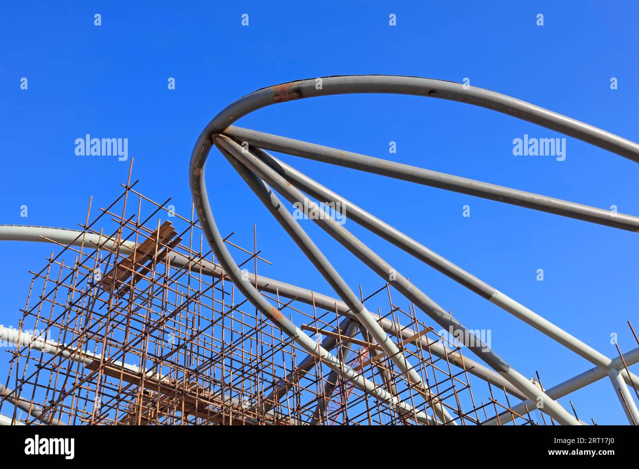 Arc steel tube landscape architecture in a construction site Stock ...