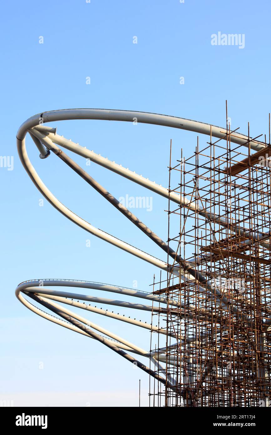 Arc steel tube landscape architecture in a construction site Stock ...
