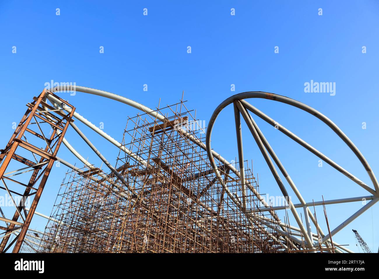 Arc steel tube landscape architecture in a construction site Stock ...