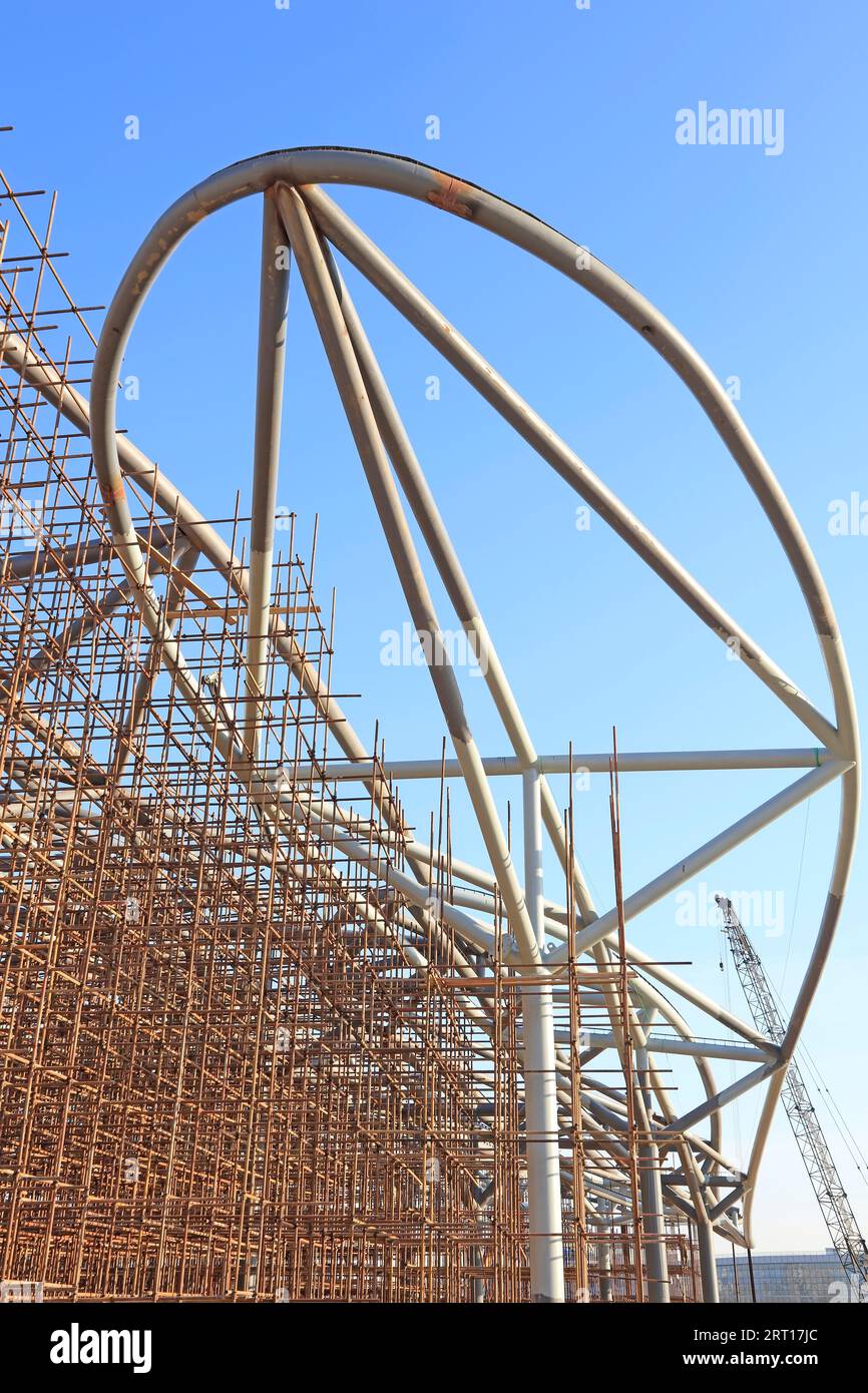 Arc steel tube landscape architecture in a construction site Stock ...