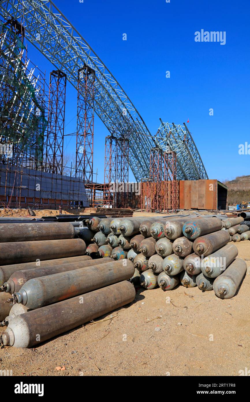 Steel frame and compressed gas cylinders in a construction site Stock ...