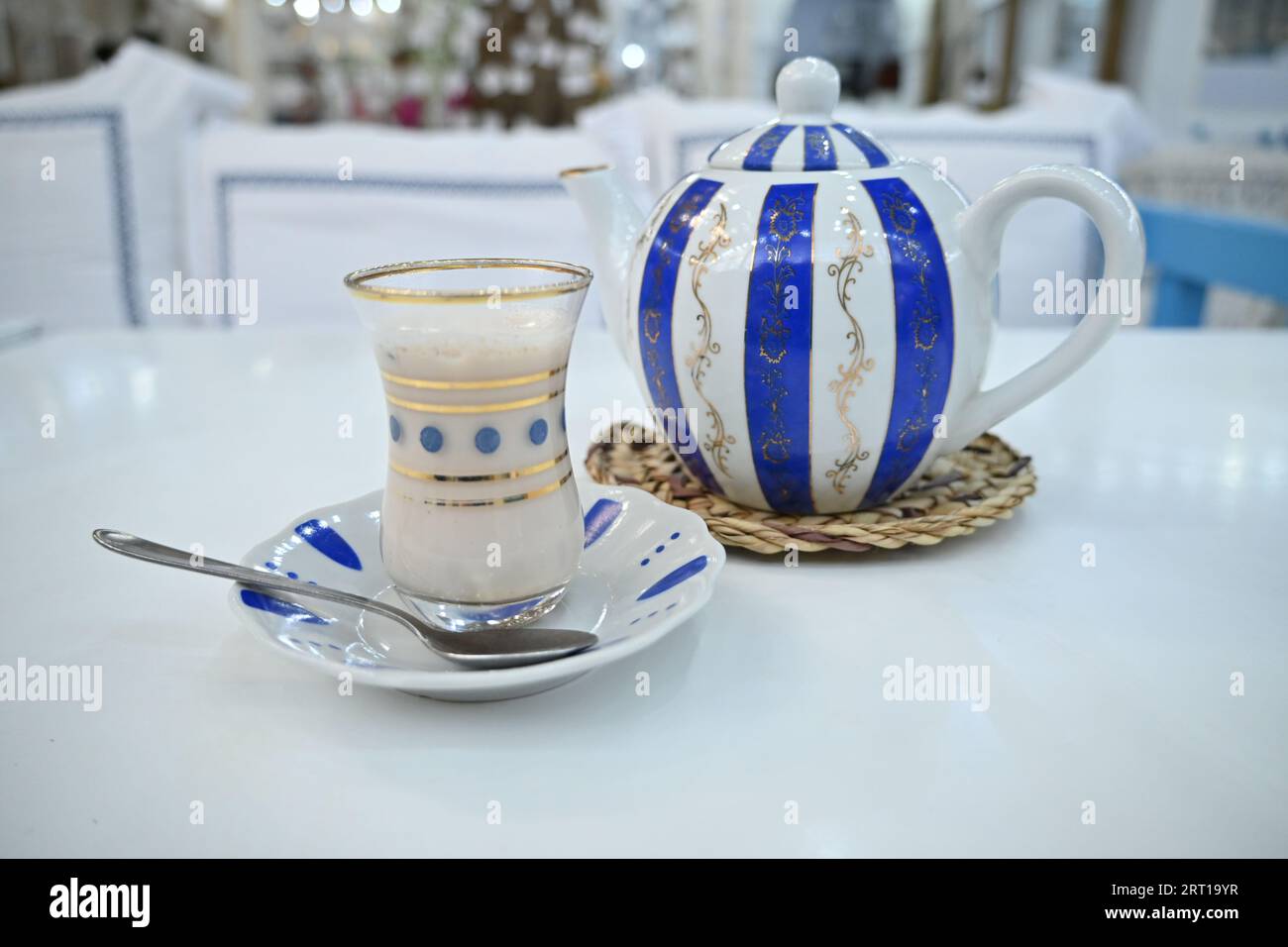 Close up view of a teapot with a cup of special local tea in Arabian ...