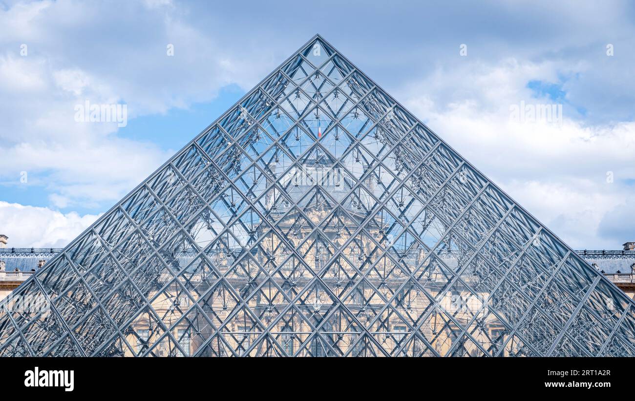 A beautiful glass pyramid of the Louvre museum in Paris, France Stock ...