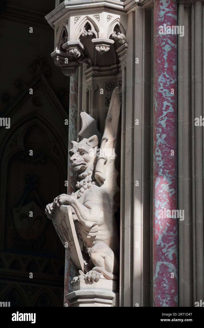 928 Gargoyle-like winged lion at the doorway to the Gothic Revival ...