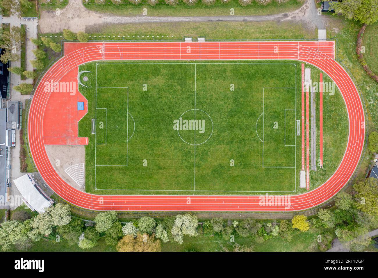 Aerial drone view of a soccer field with a red running track Stock ...
