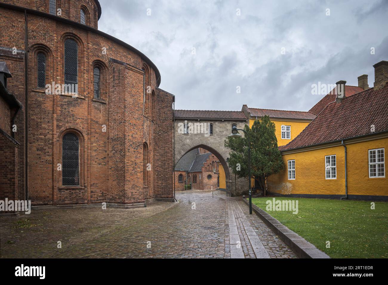 The Absalon Arch between bishop's palace and Gothic Roskilde Cathedral ...