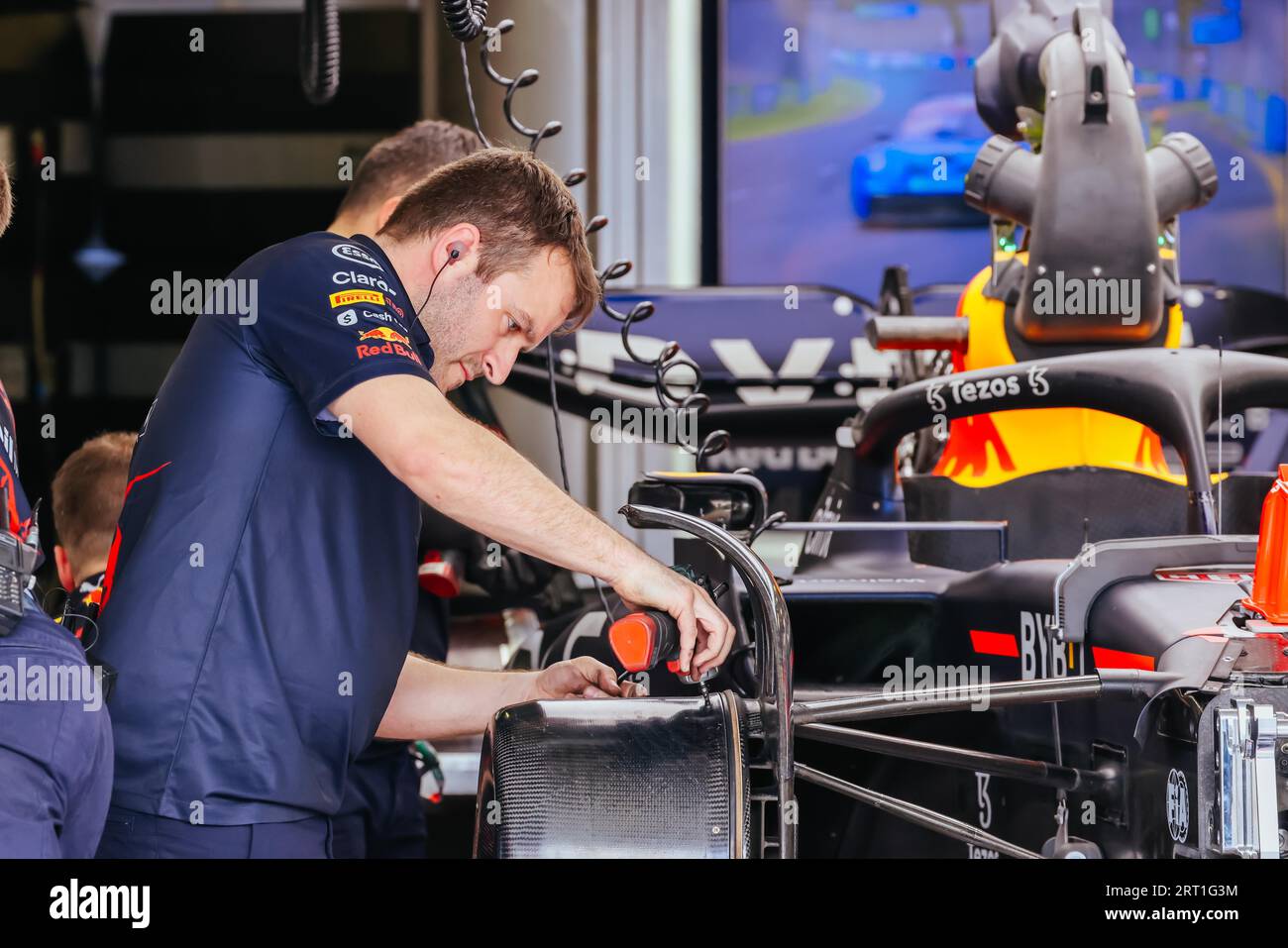 MELBOURNE, AUSTRALIA, APRIL 9: Red Bull Racing mechanics work on Sergio ...