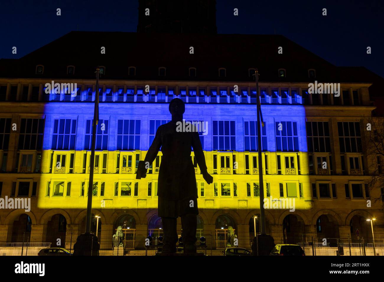 Dresden City Hall illuminated in the Ukrainian national colours, in the ...