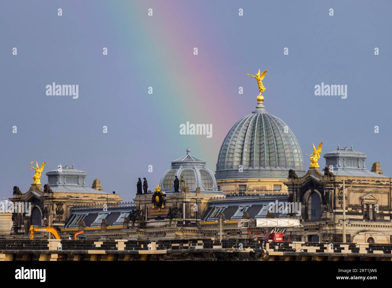 An incipient rainbow above the glass dome of the Academy of Arts with ...
