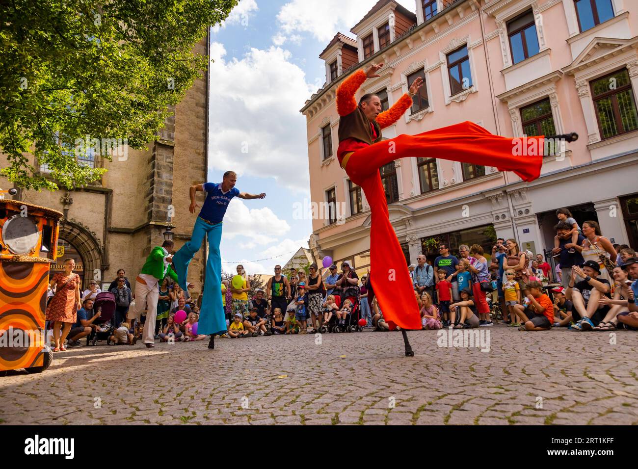 Actors, artists, clowns, fire artists and music bands transformed the ...