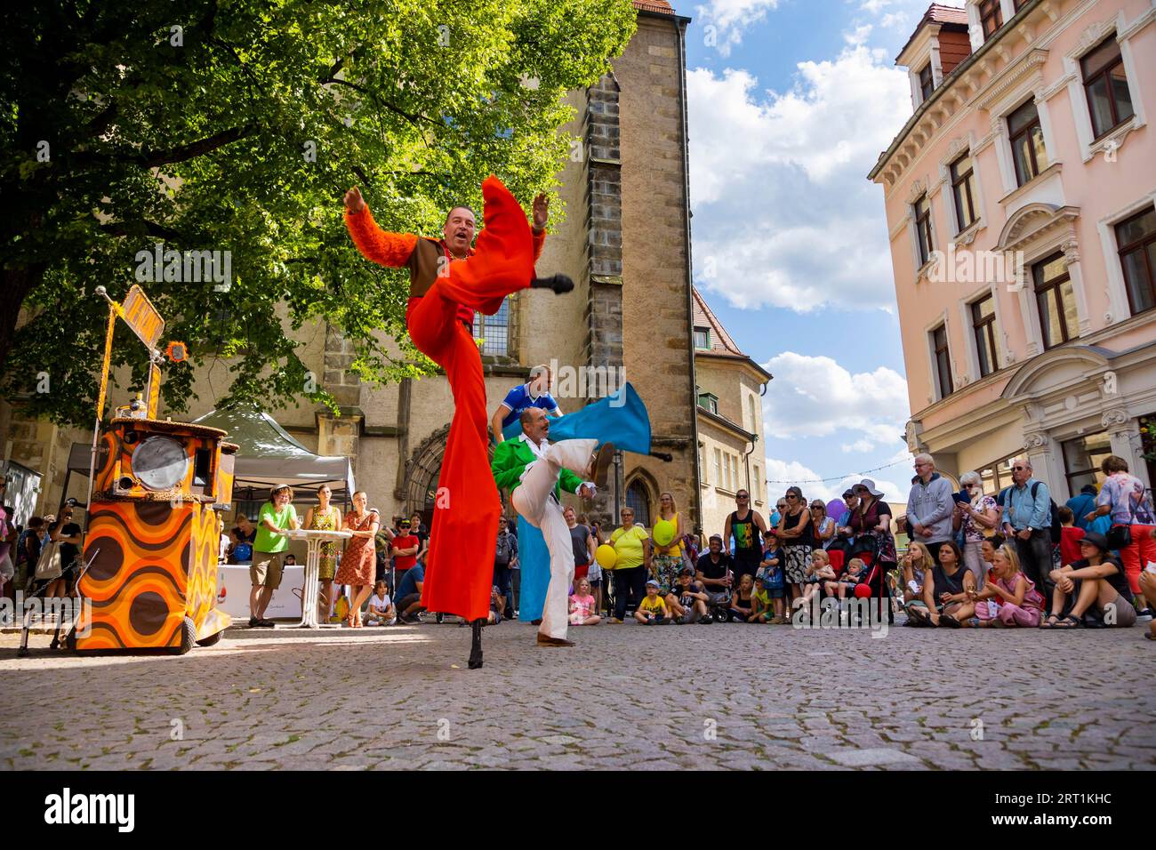 Actors, artists, clowns, fire artists and music bands transformed the ...