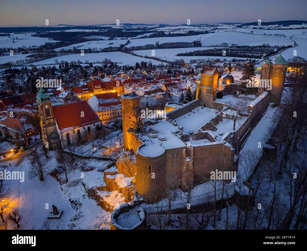 Castle and town of Stolpen on a winter evening Stock Photo - Alamy