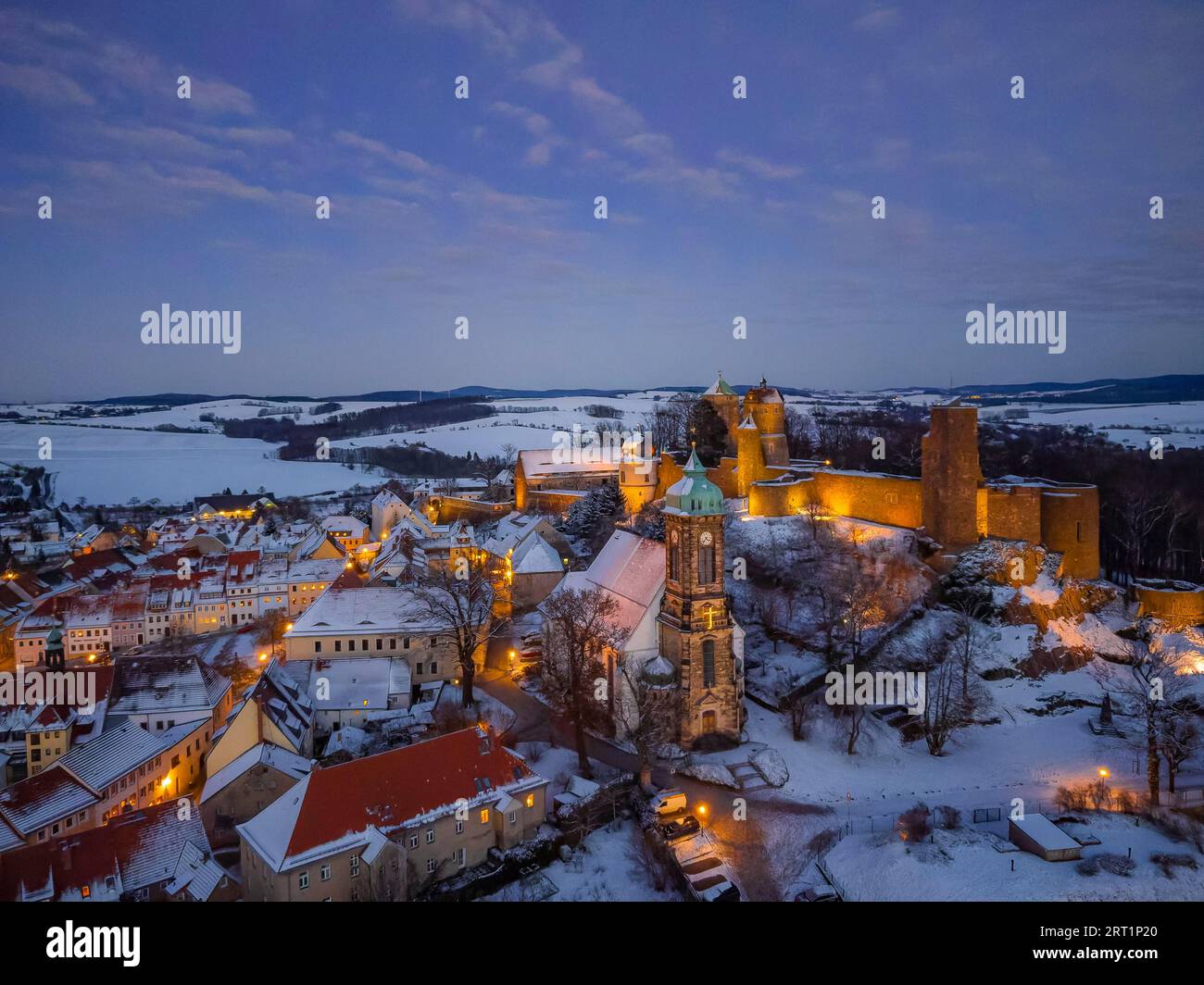 Castle and town of Stolpen on a winter evening Stock Photo - Alamy