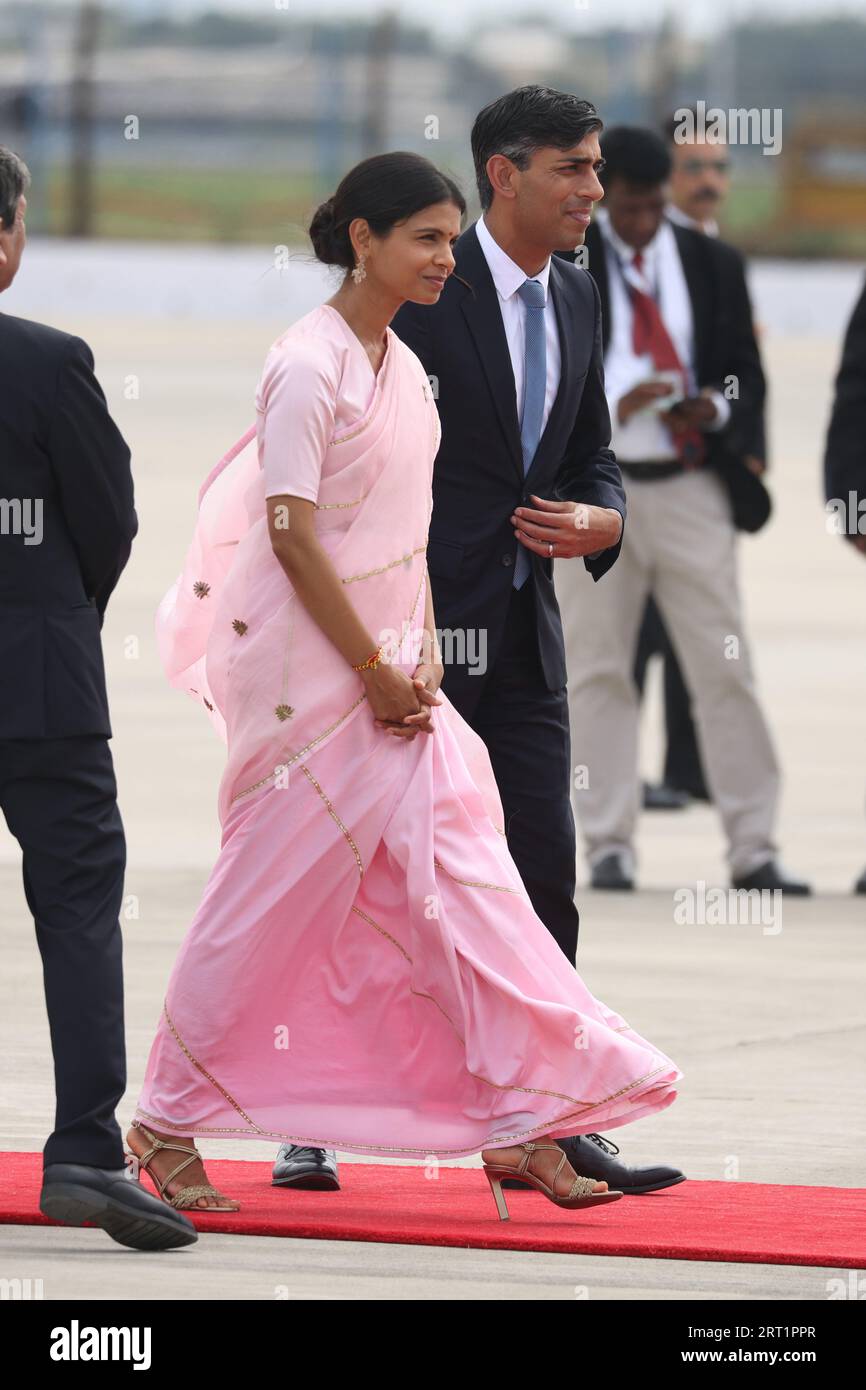 Prime Minister Rishi Sunak and his wife Akshata Murty board a plane after the G20 Summit in New ...
