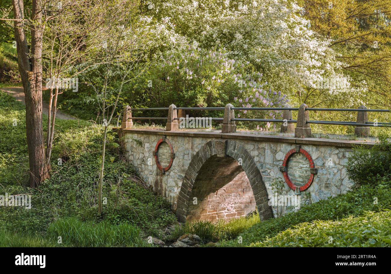 The old bridge in the park Stock Photo - Alamy