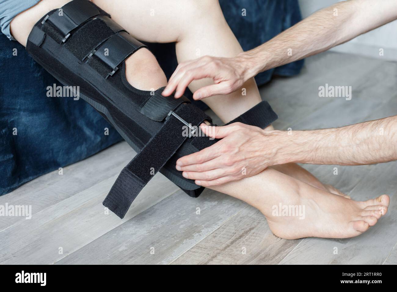 Physiotherapist hands, knee brace and woman with injury, pain and torn ...