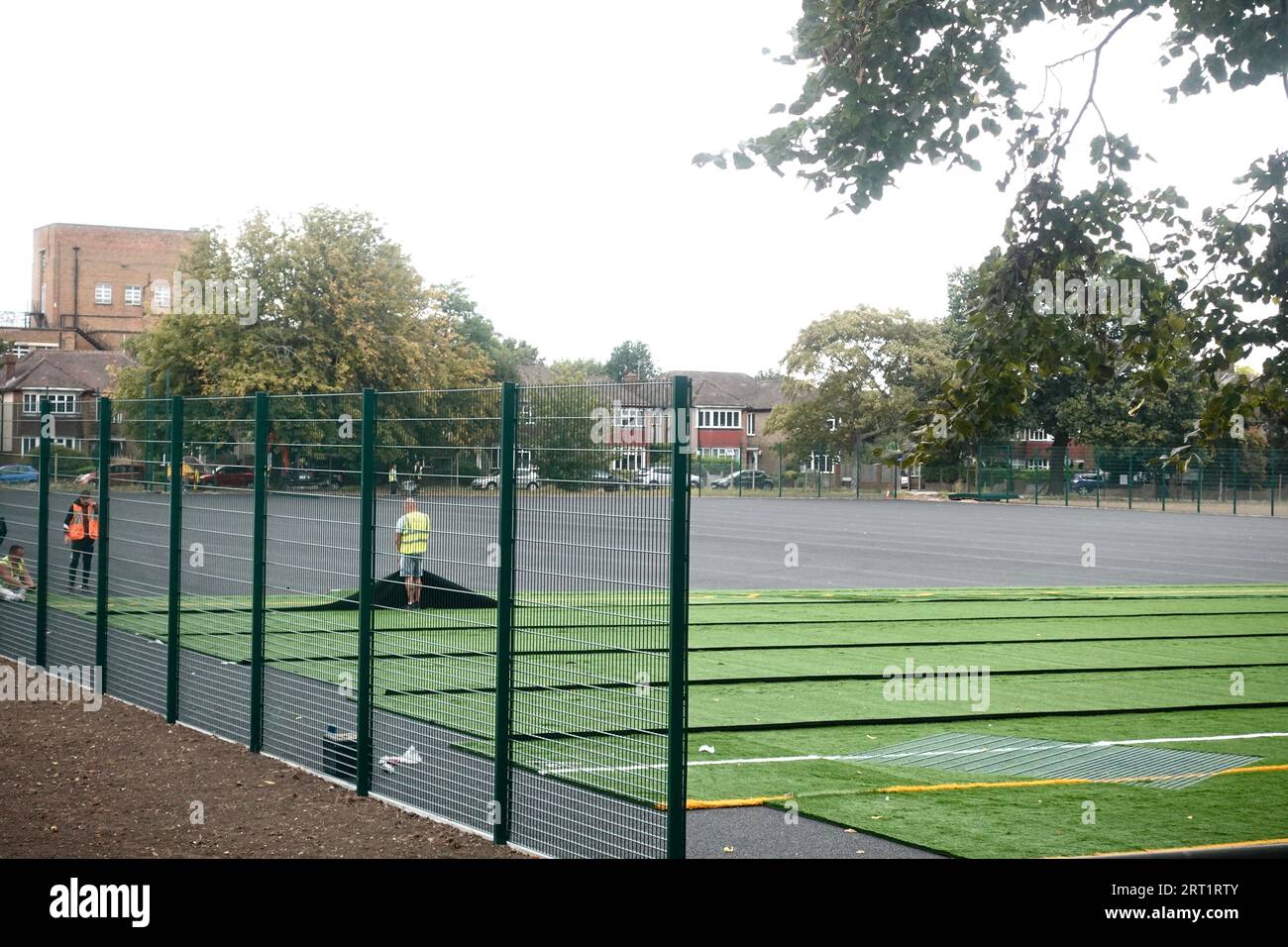 Astro Turf being laid over rugby & football fields in south west London ...