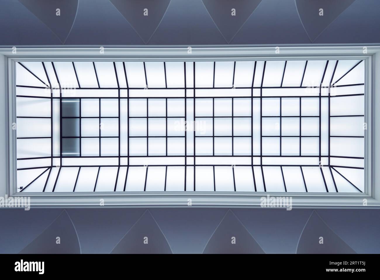 Looking up at bright skylight window in roof of a museum Stock Photo ...
