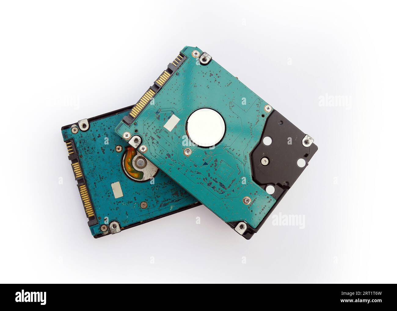 Detailed view of the inside of a hard disk drive in white background ...
