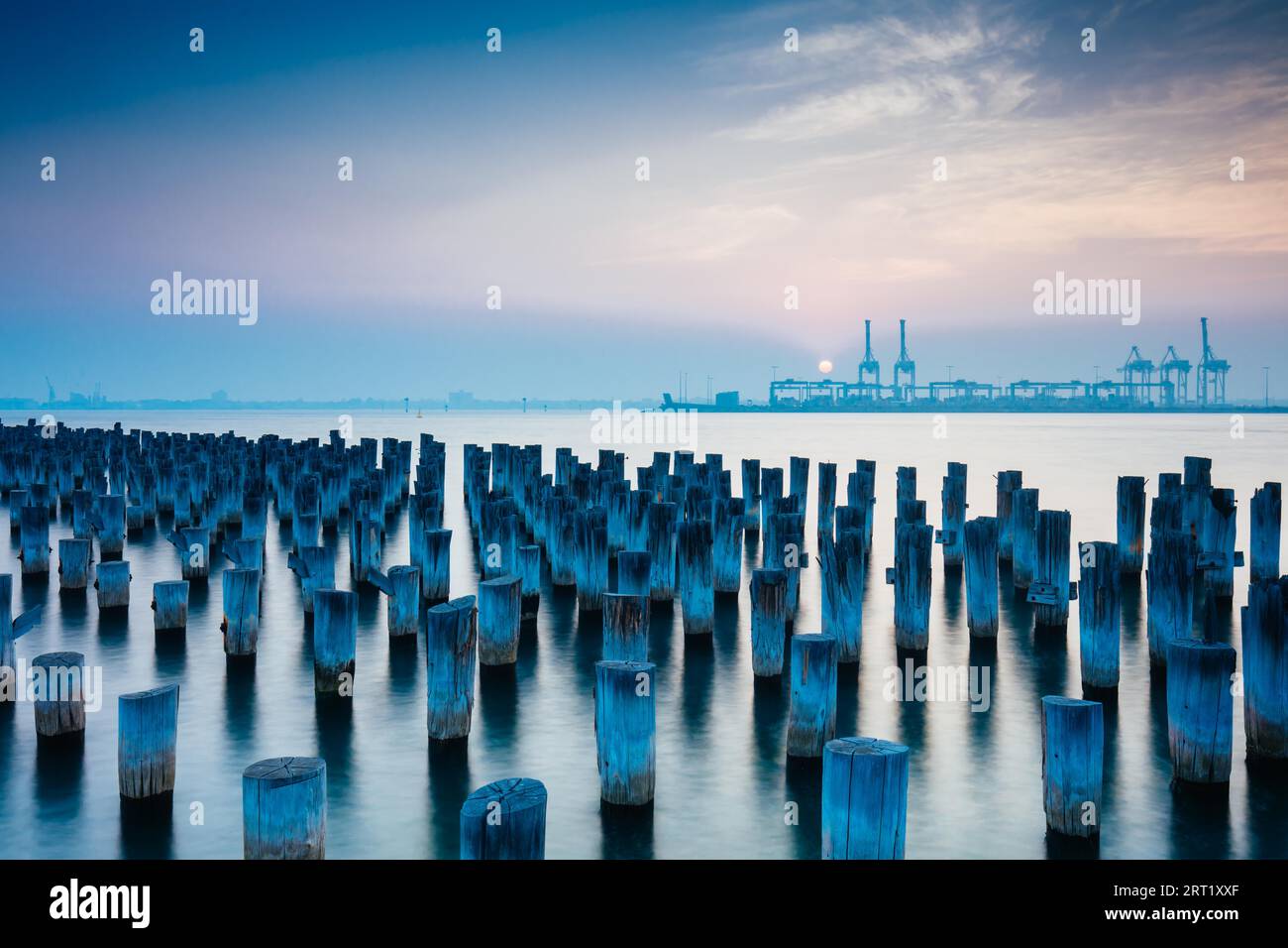 The historic Princes Pier featuring many disused pylons on a hot summer ...