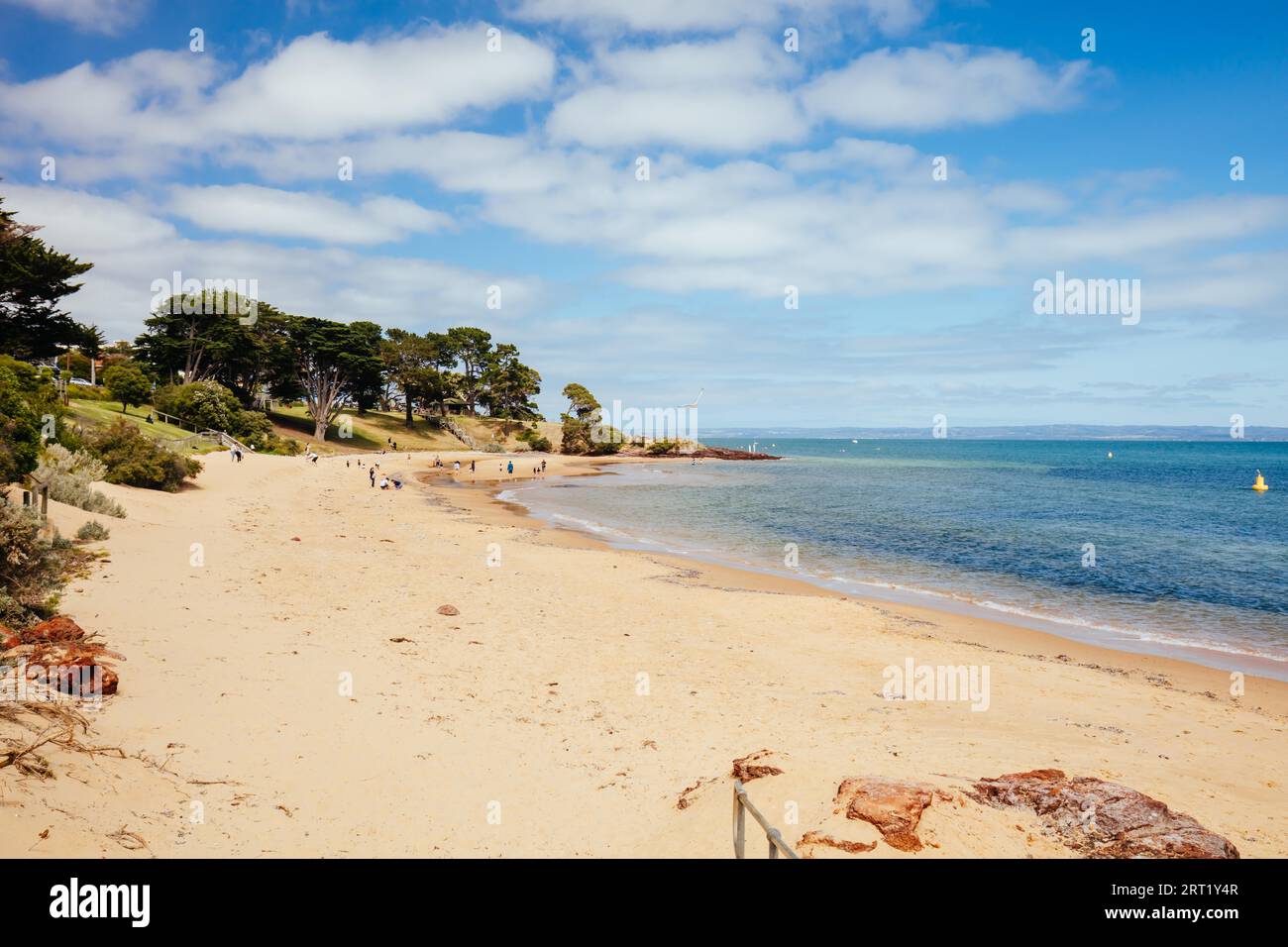 Cowes Foreshore and its iconic jetty and beach on a warm summer's day ...