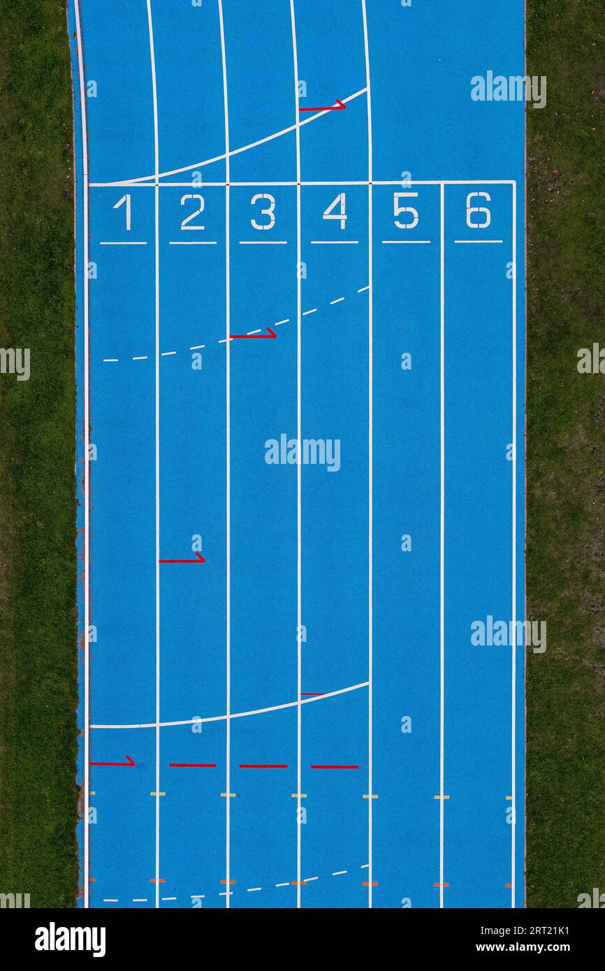 Aerial View of a blue running track Stock Photo - Alamy