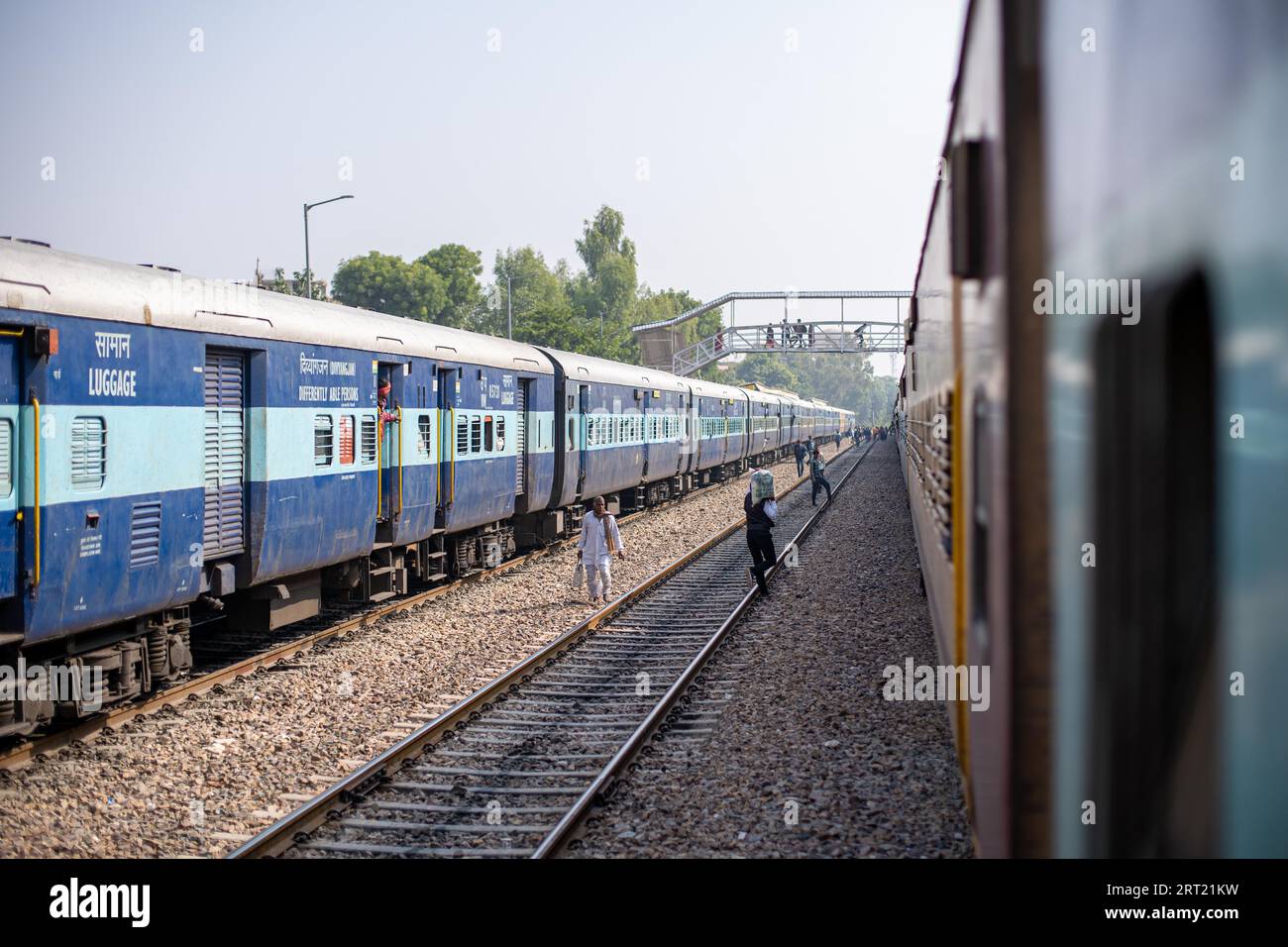 Jodhpur, India, December 10, 2019: People on the railroad tracks ...