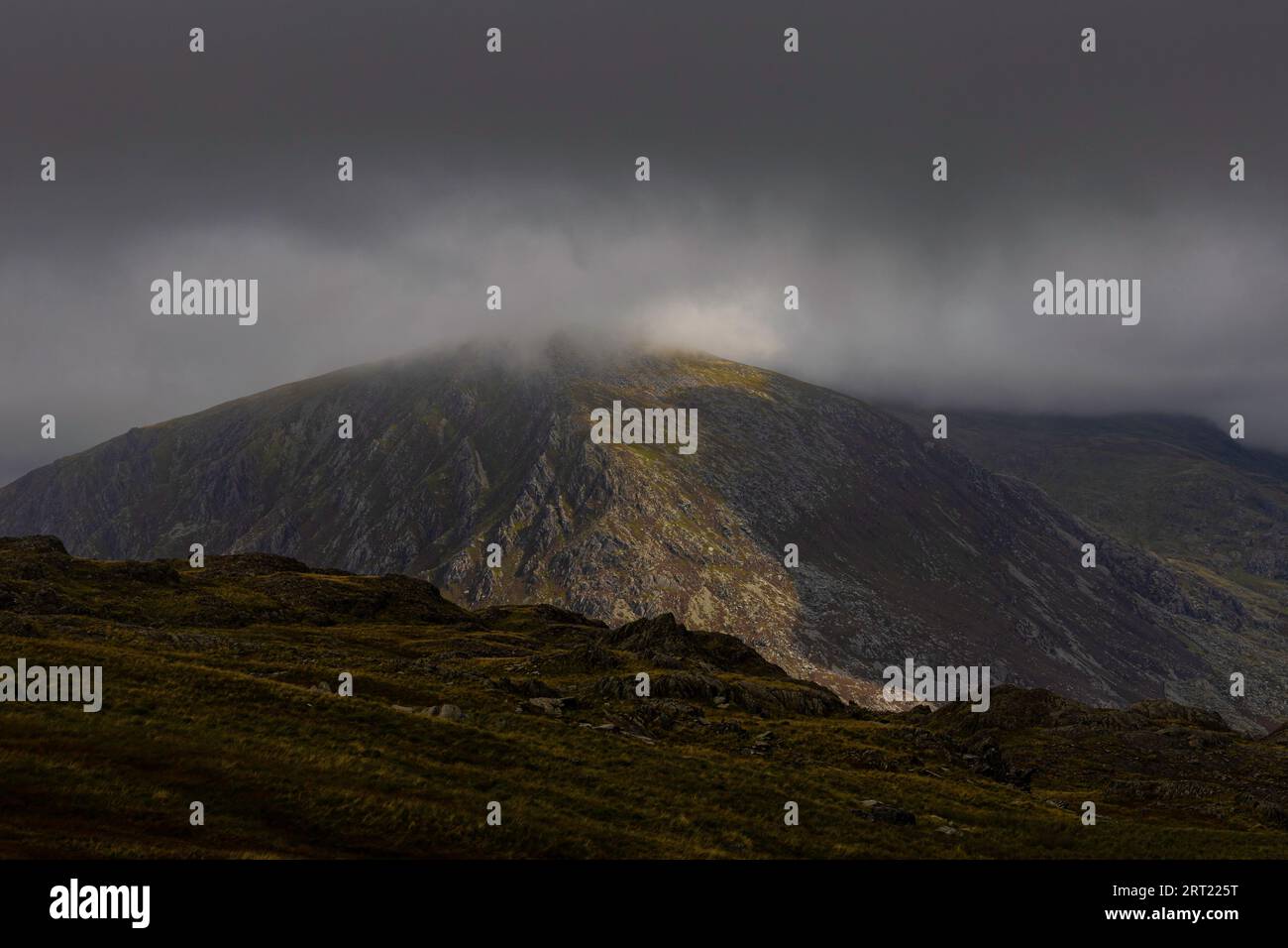 Breaking Light on Mountain Stock Photo - Alamy