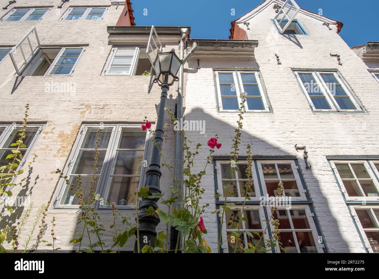 Old house facade in beautiful historic old town alleyway Stock Photo ...