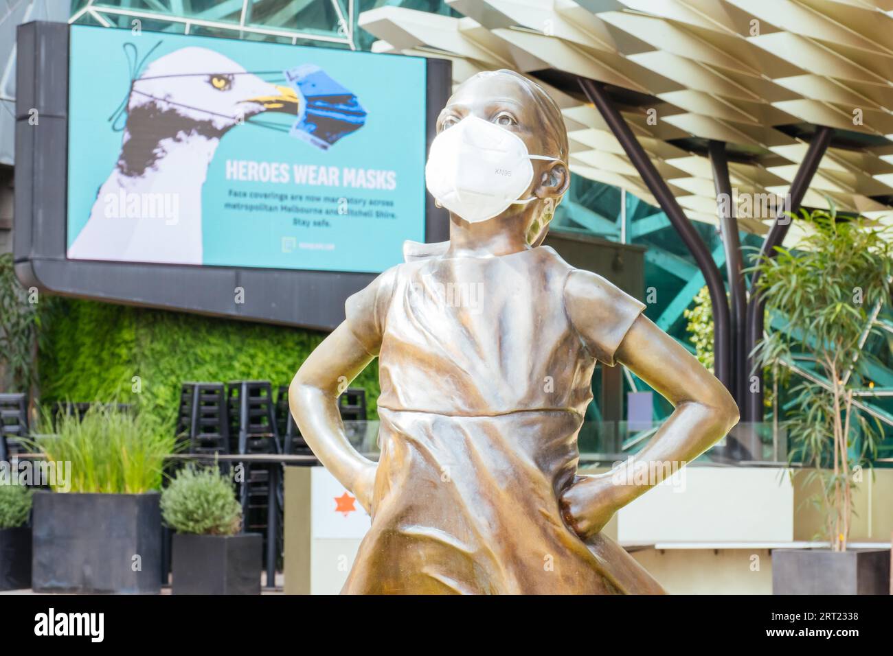 Melbourne, Australia, October 10th 2020: Federation Square and a masked ...
