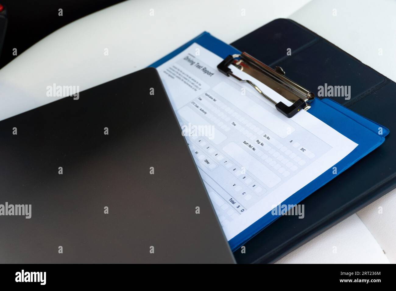 Empty driving test report in the car. Close up. Ready for the exams ...