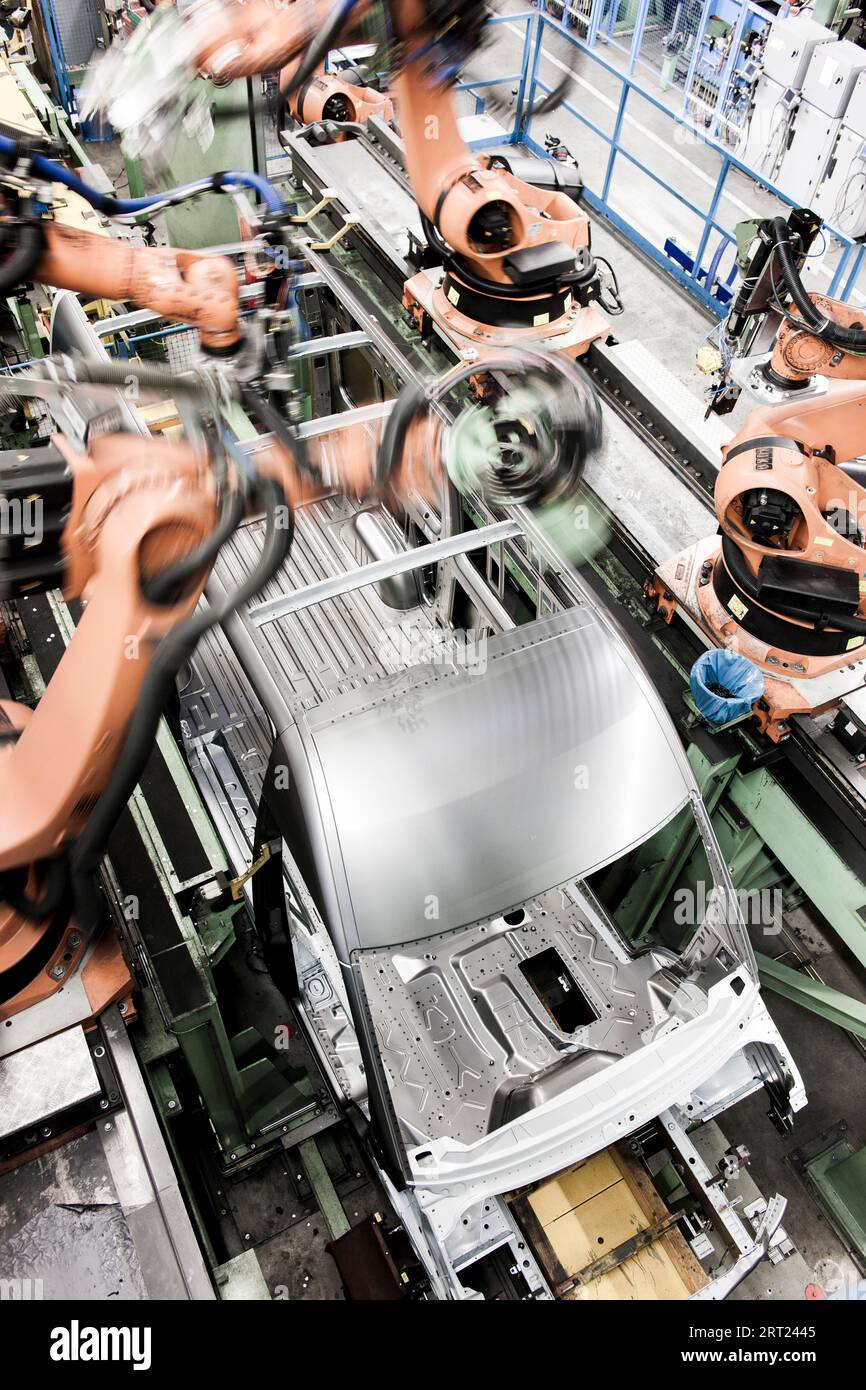 Robots welding a car at Mercedes-Benz, Duesseldorf, Germany Stock Photo ...