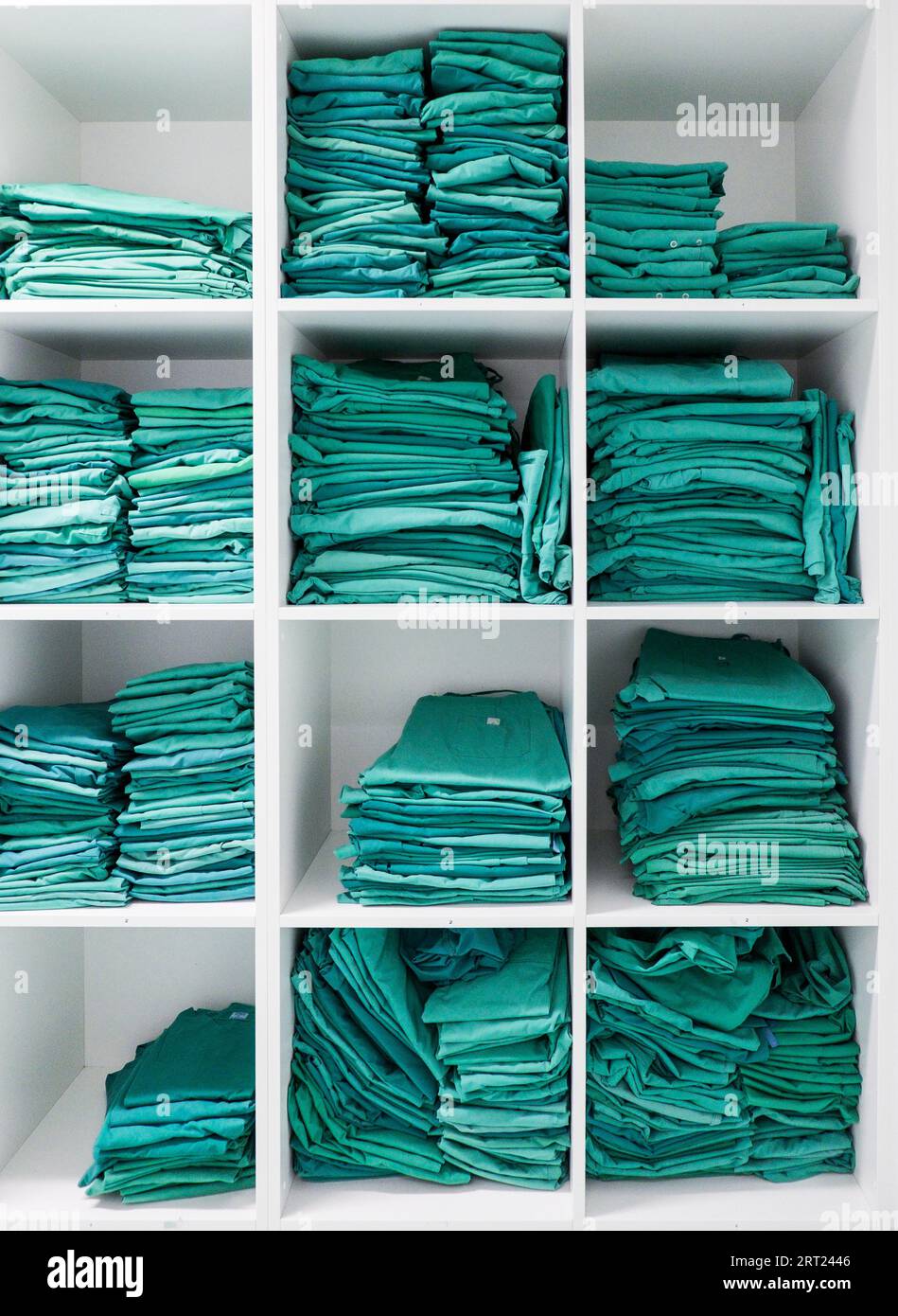 Shelf with pile of surgical clothing in a hospital, Duesseldorf ...