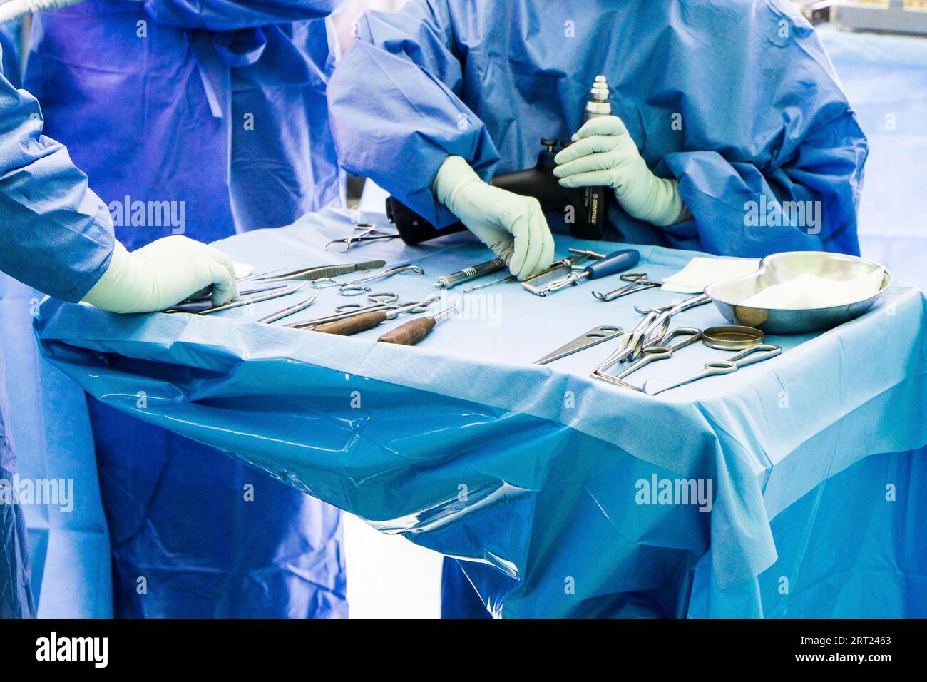 Cutlery table with surgical instruments during an operation in hospital ...