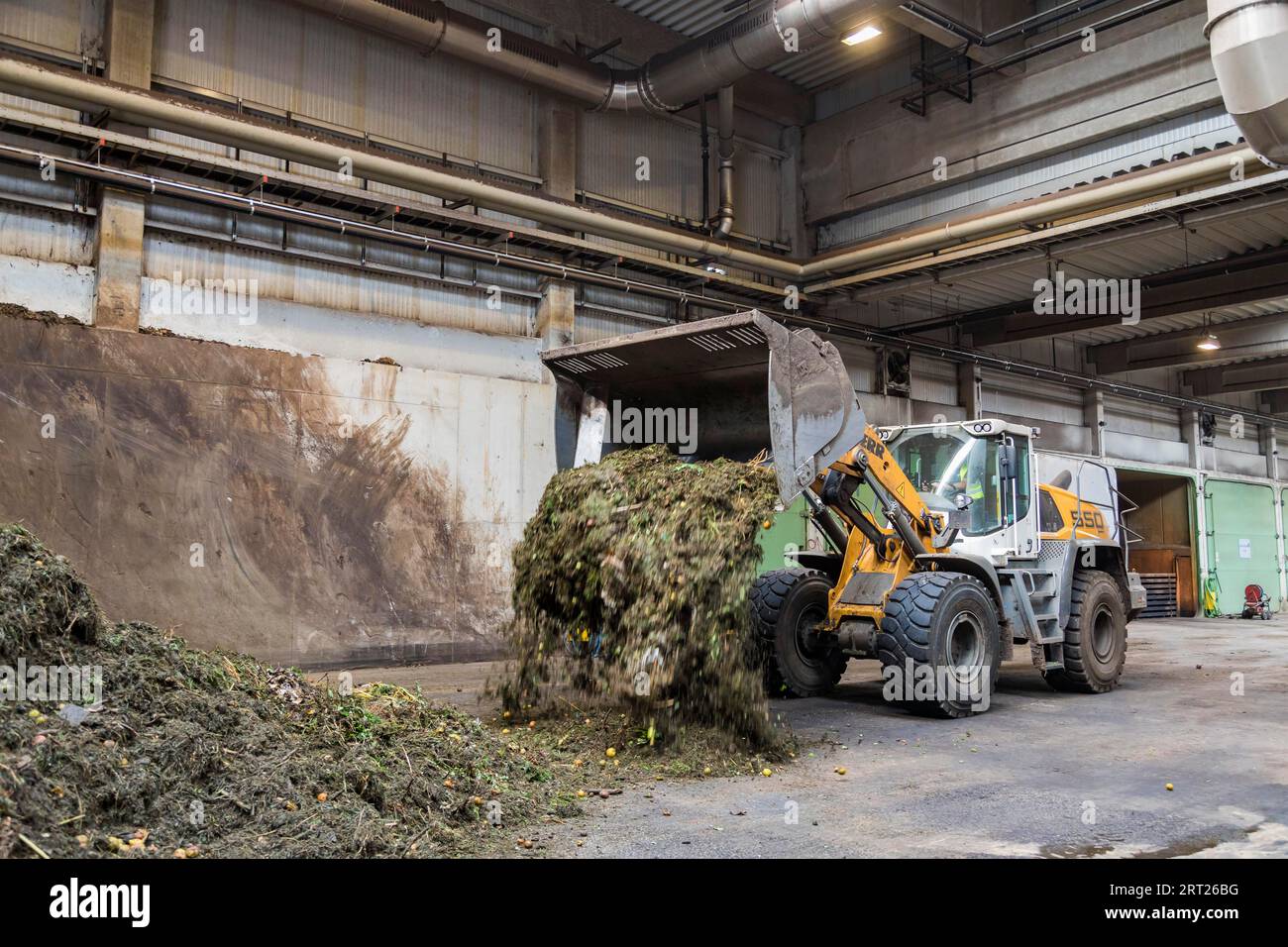 A wheel loader is used to move the biowaste delivered to the MVV biogas ...