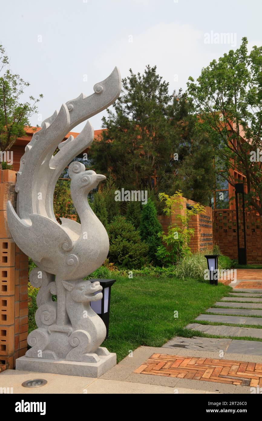 Phoenix sculpture in the park Stock Photo - Alamy