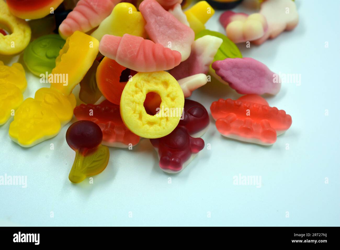 Bright, juicy and unusual jelly, gummies, sweets of different shapes ...