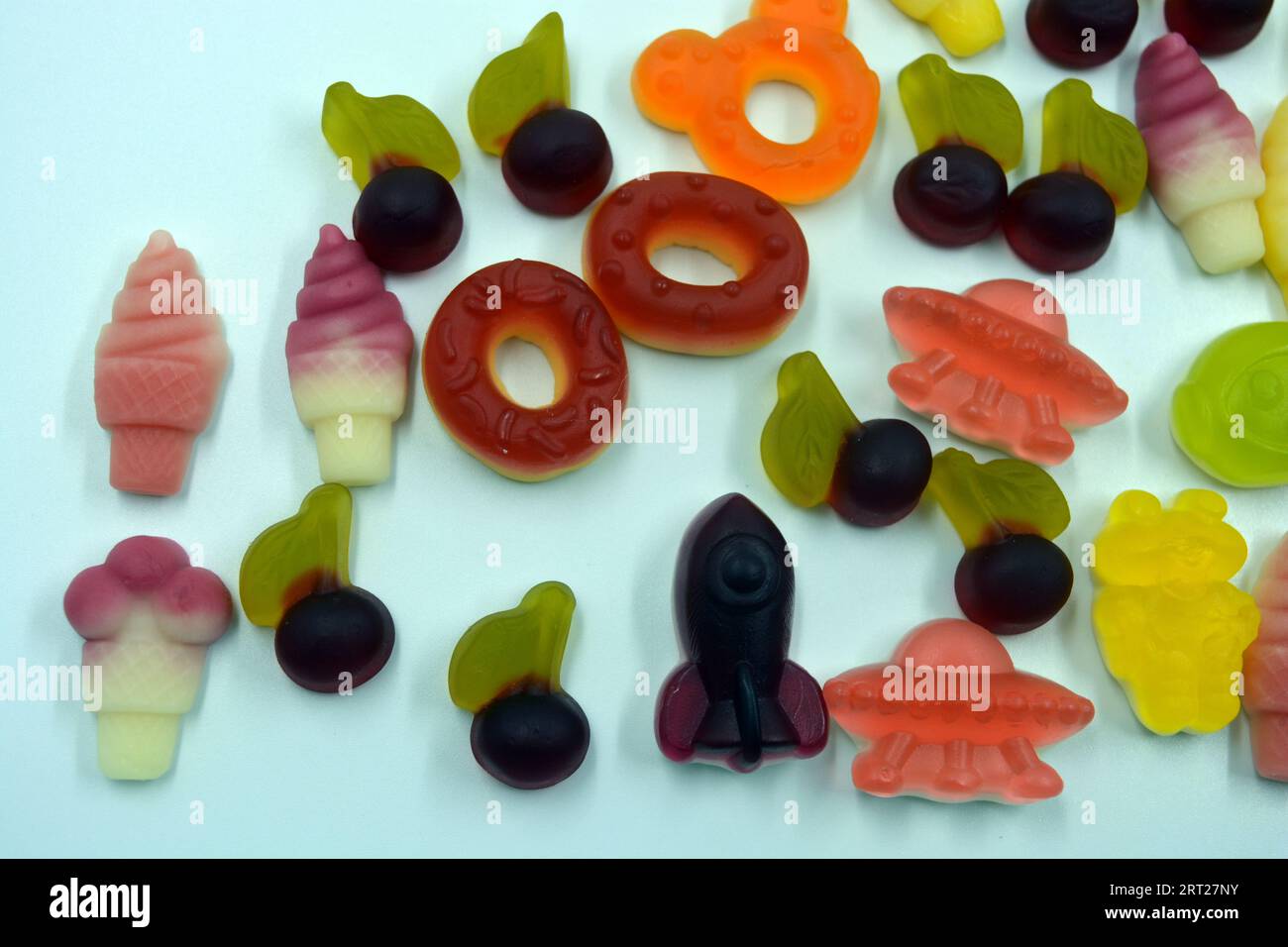 Bright, juicy and unusual jelly, gummies, sweets of different shapes ...