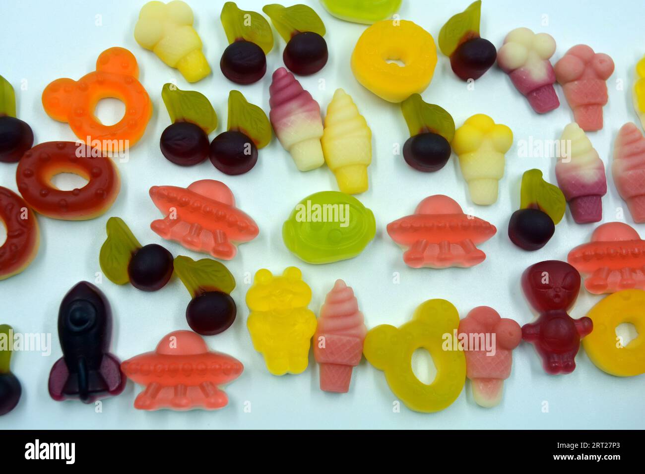 Bright, juicy and unusual jelly, gummies, sweets of different shapes ...