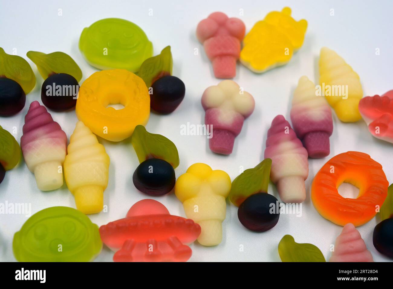 Bright, juicy and unusual jelly, gummies, sweets of different shapes ...