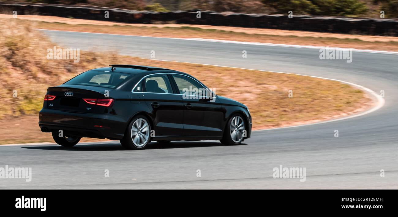 The rear view of an Audi A3 on a track racing Stock Photo - Alamy