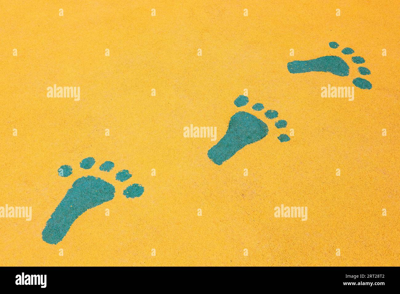 footprints are on the yellow ground Stock Photo - Alamy
