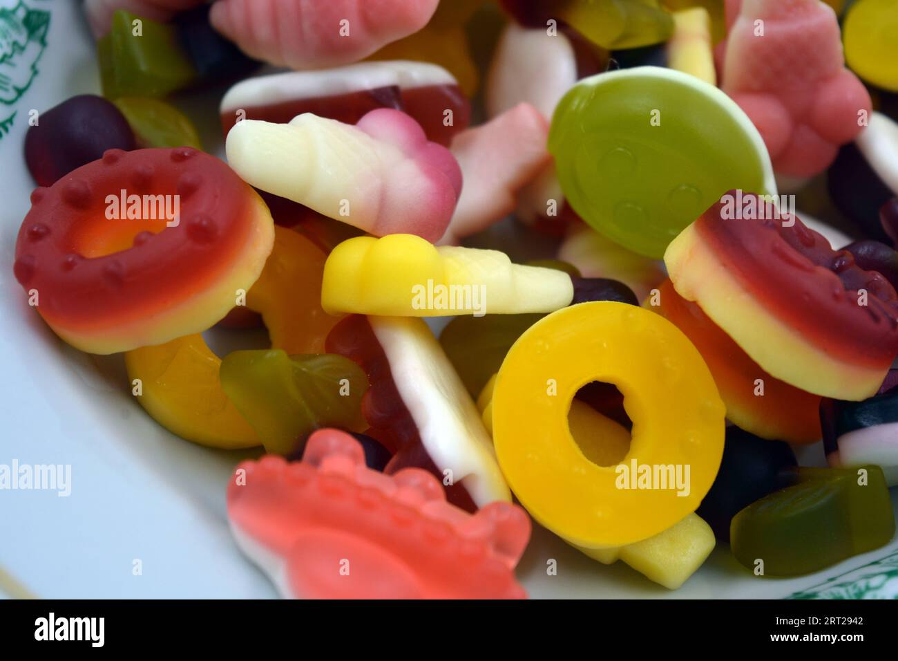 Bright, juicy and unusual jelly, gummies, sweets of different shapes ...