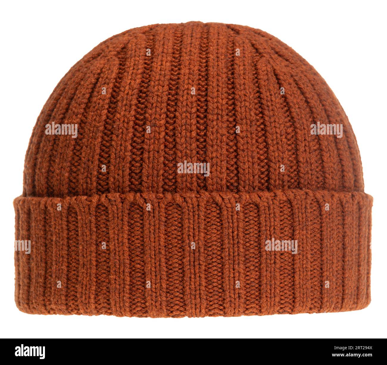 Red knitted winter bobble hat of traditional design isolated on white ...