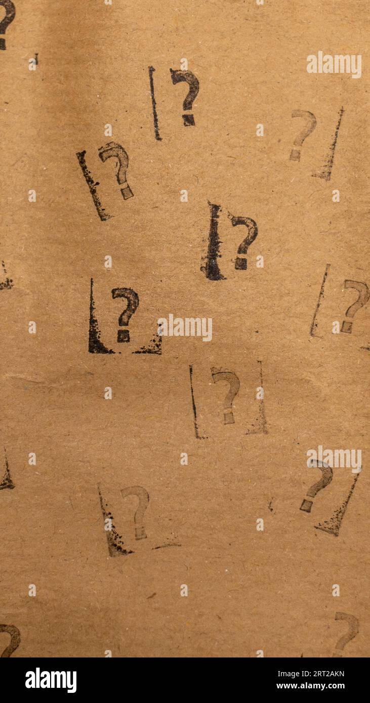 craft paper with many stamped questions marks Stock Photo - Alamy